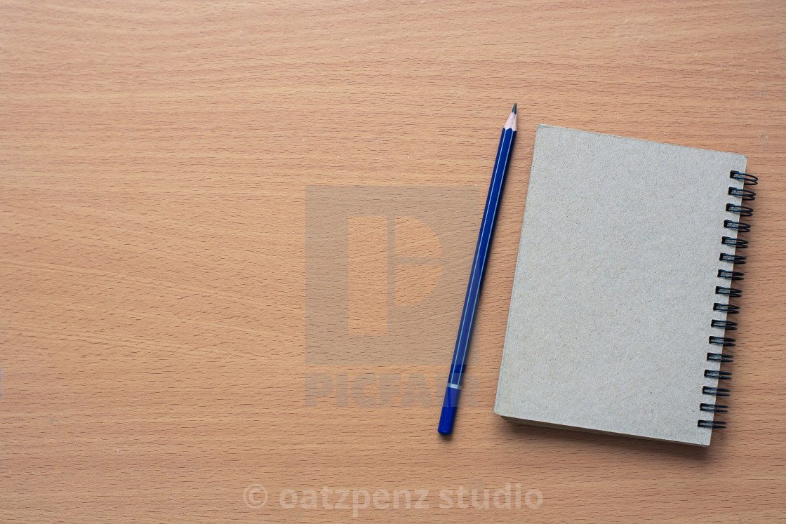 Notepad With Pencil On Wood Board Background - Photograph - 1120x747 ...
