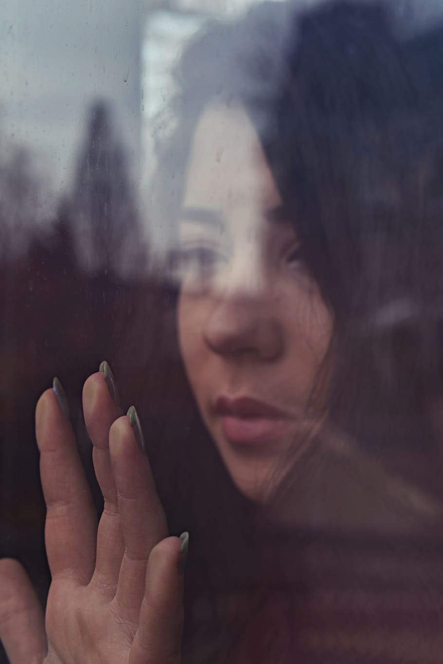 Shallow Focus Photo Of Woman Touching Window Glass Sad Crying Girl